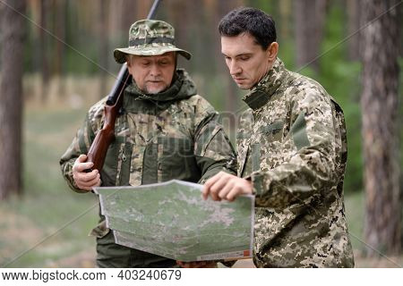 Hunters Studying Map Image & Photo (Free Trial) | Bigstock