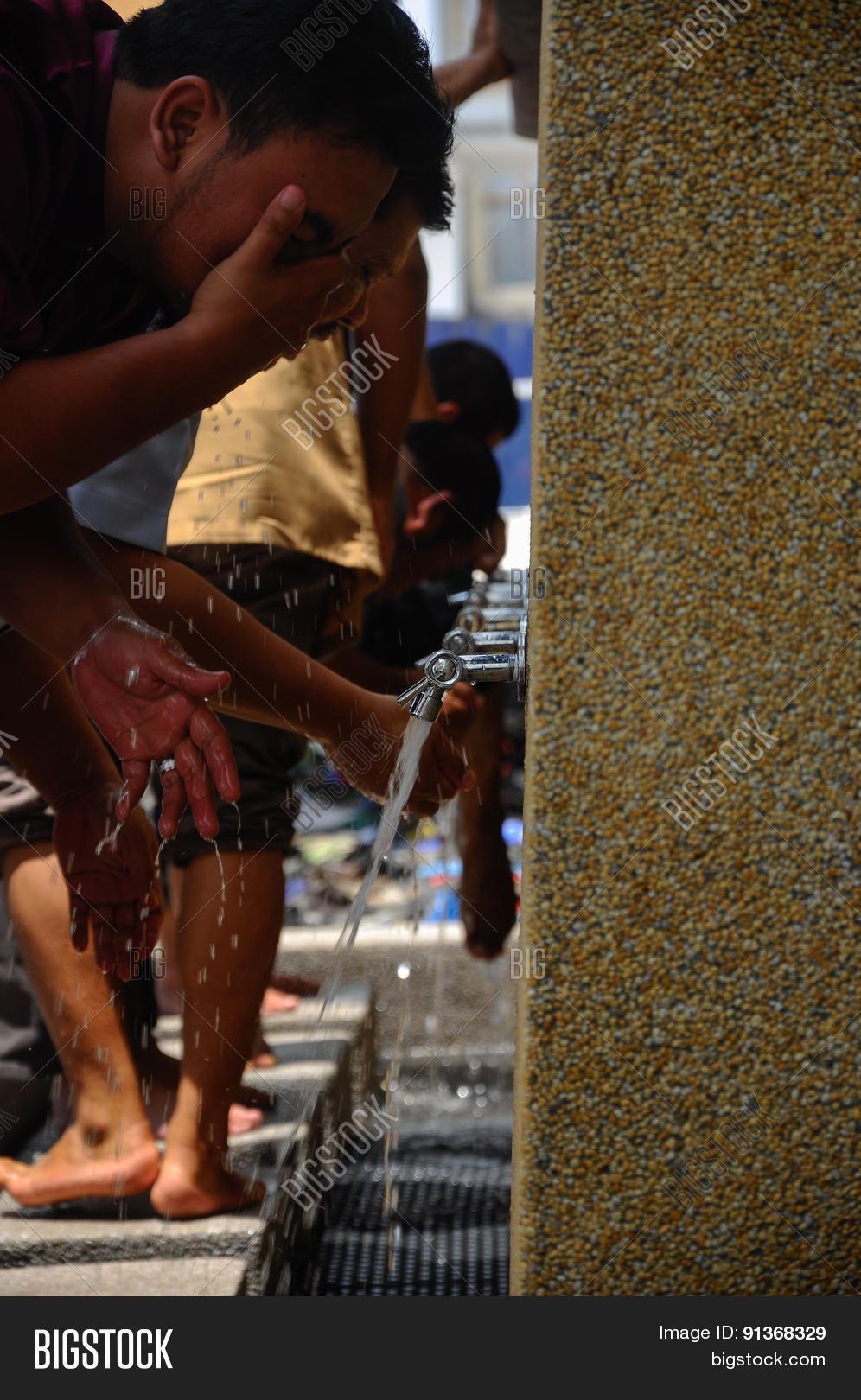 Men Using Ablution Image & Photo (Free Trial) | Bigstock