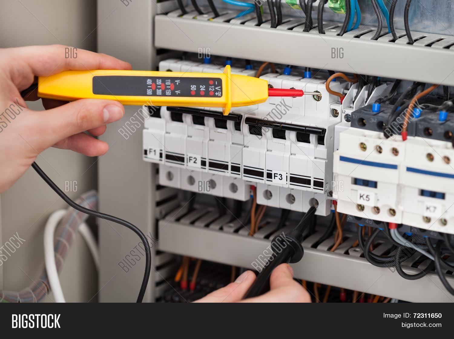 Electrician Examining Image & Photo (Free Trial) | Bigstock