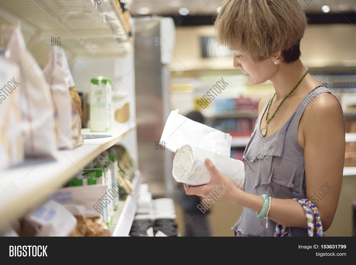 Woman Checking Info On Image & Photo (Free Trial) | Bigstock