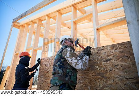 Carpenters Hammering Image & Photo (Free Trial) | Bigstock