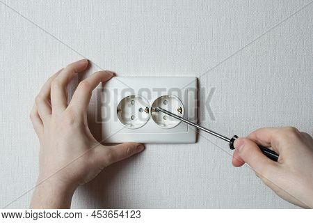 Girl Installs Socket Image & Photo (Free Trial) | Bigstock