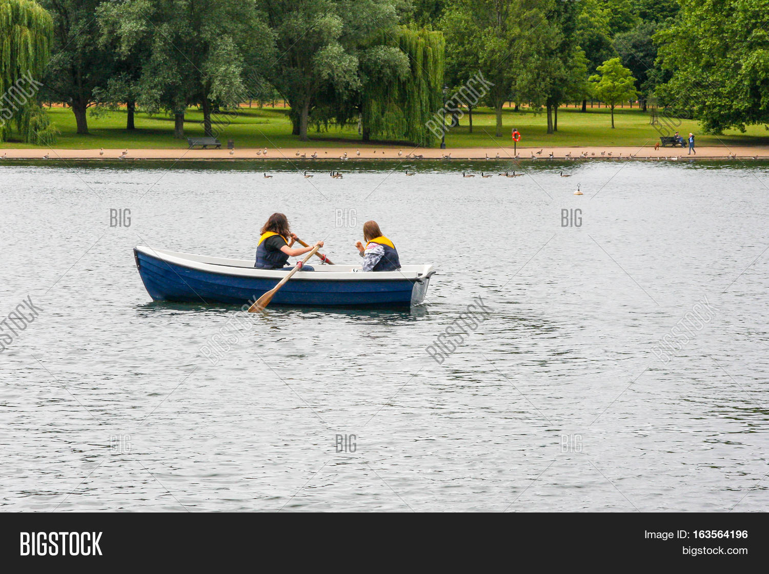 Rowing Small Boat On Image & Photo (Free Trial) | Bigstock
