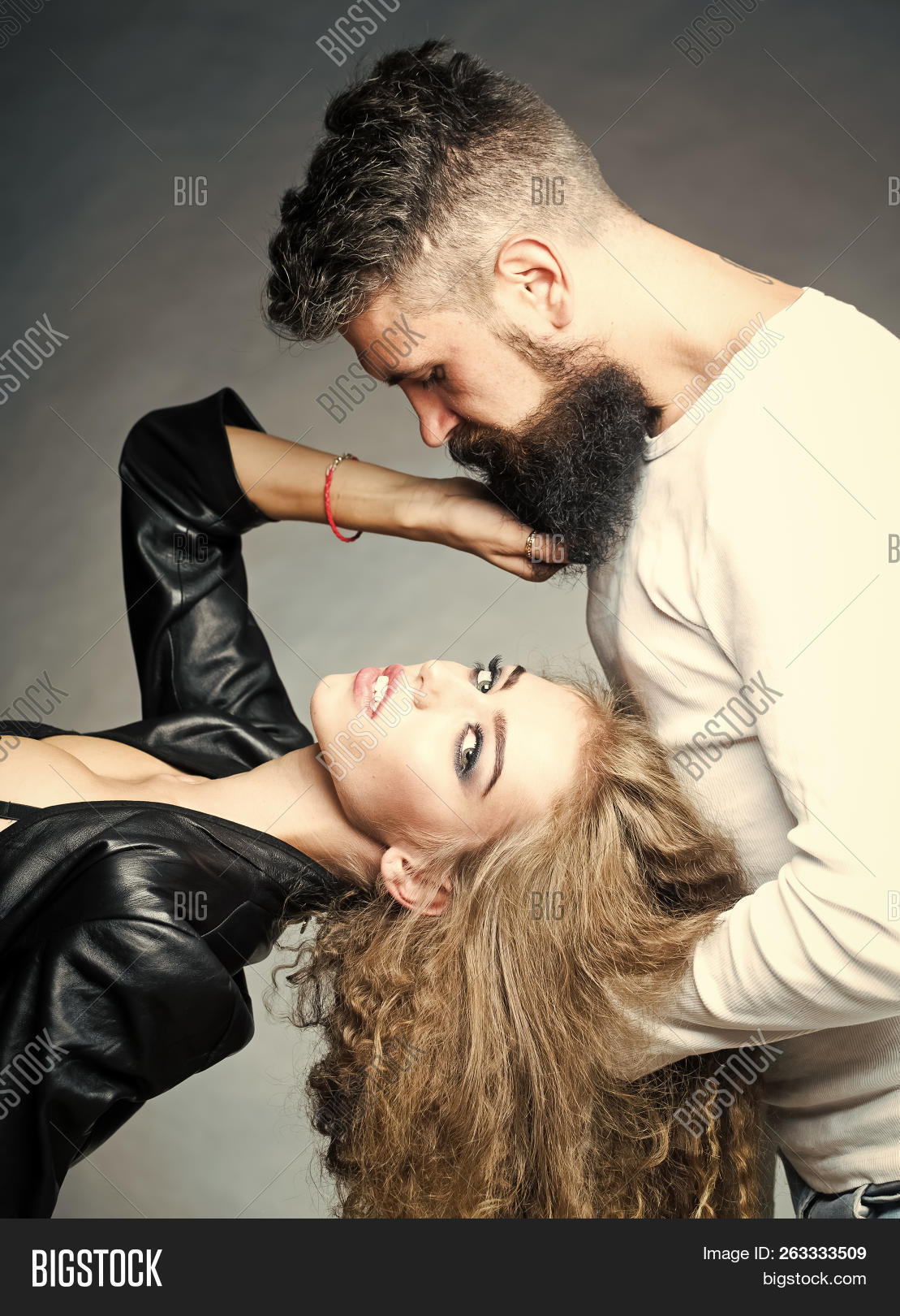 Girl Caressing Man Face