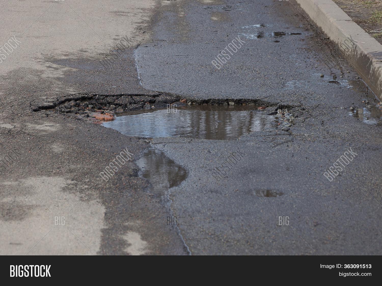 One Large Pothole Image & Photo (Free Trial) | Bigstock