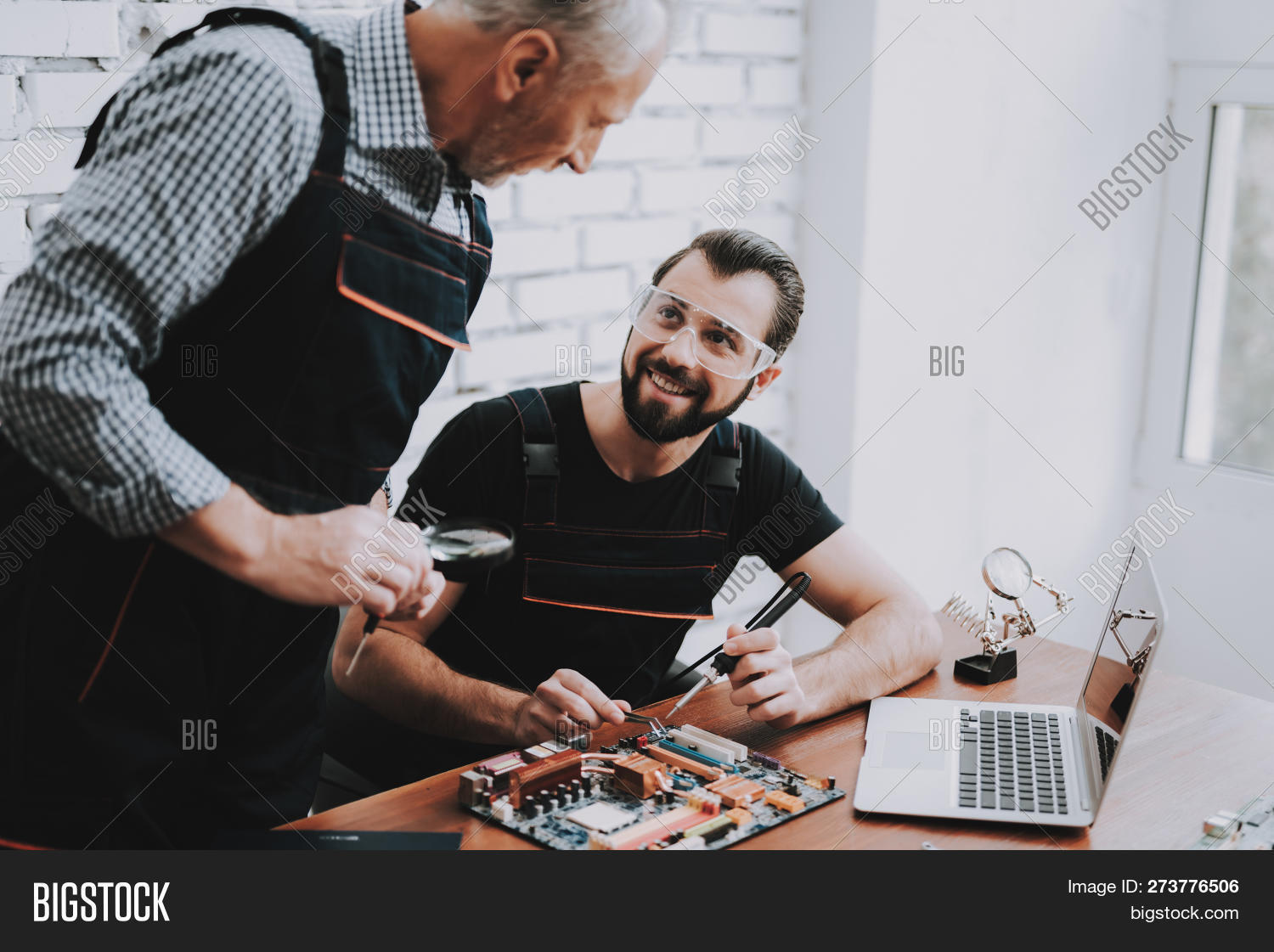 Two Men Repairing Image & Photo (Free Trial) | Bigstock