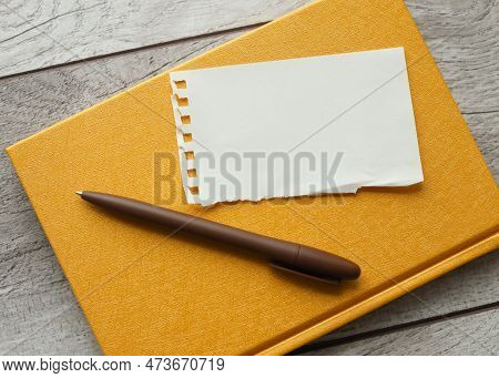 Torn Yellow Notebook Paper