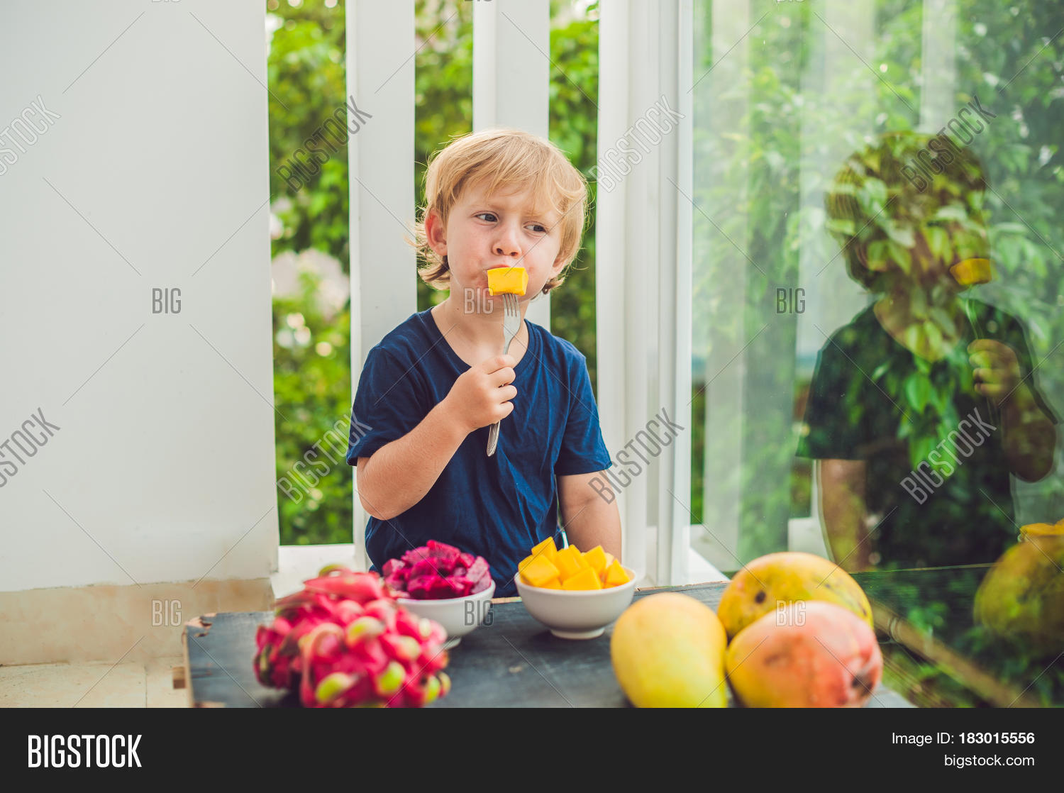 Little Cute Boy Eating Image & Photo (Free Trial) | Bigstock