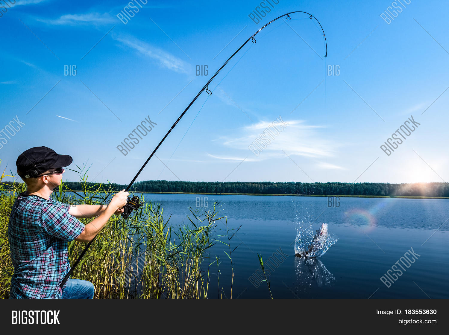 Angler Holds Fishing Image & Photo (Free Trial) | Bigstock