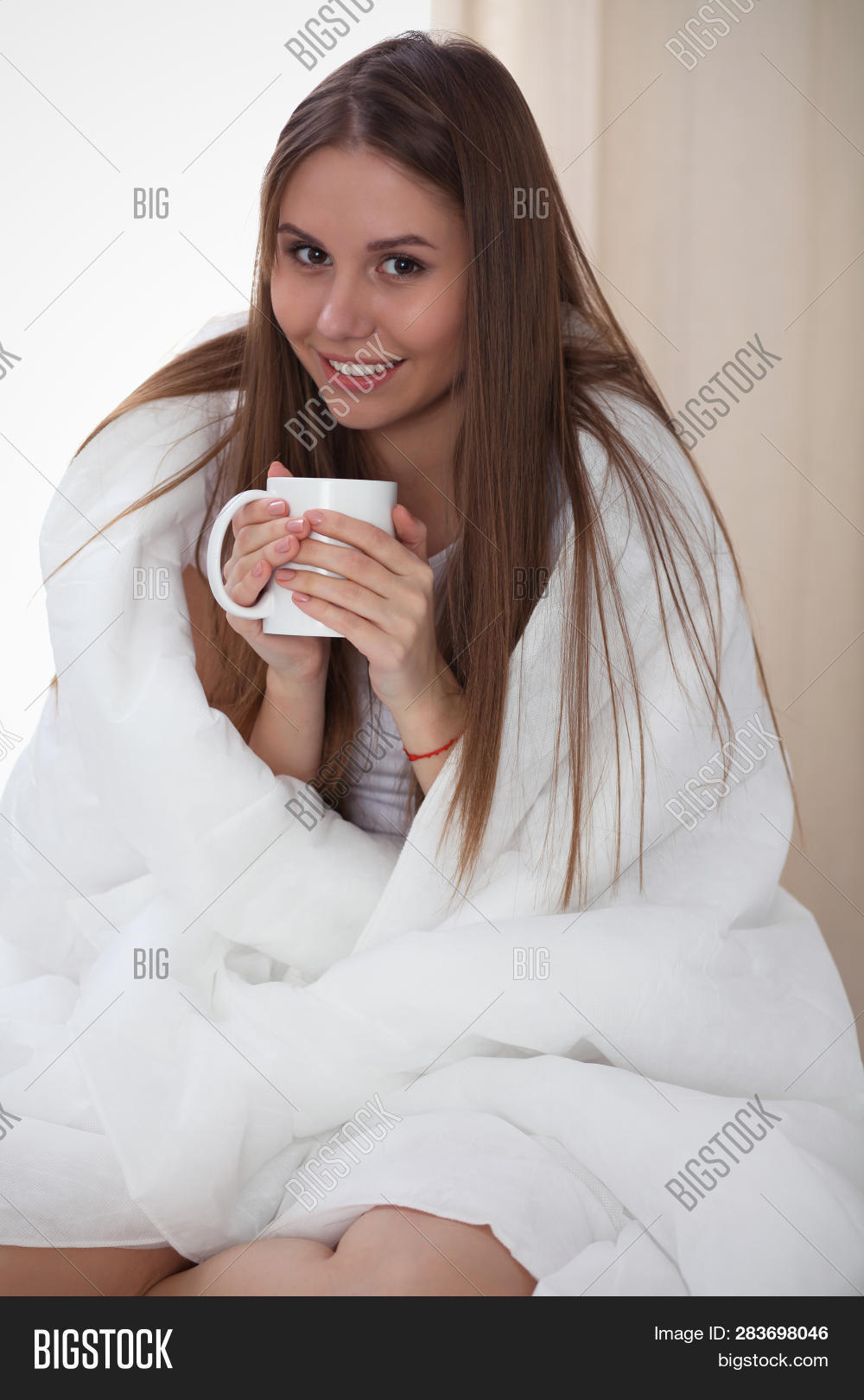 Woman Wrapped In Blanket