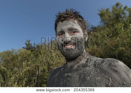 Smiling Man Mud Bath Image & Photo (Free Trial) | Bigstock