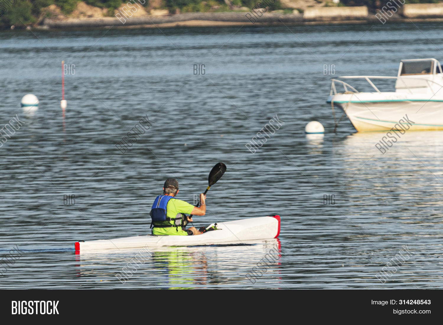 Man Kayaking Harbor On Image & Photo (Free Trial) | Bigstock
