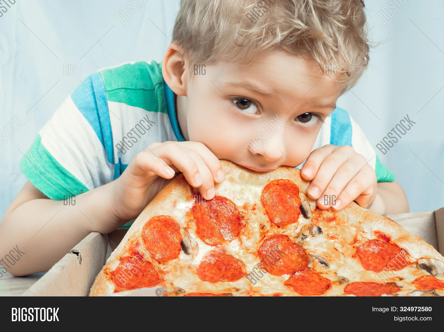 Boy Eating Pepperoni Image & Photo (Free Trial) | Bigstock
