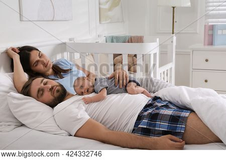 Tired Young Parents Image & Photo (Free Trial) | Bigstock