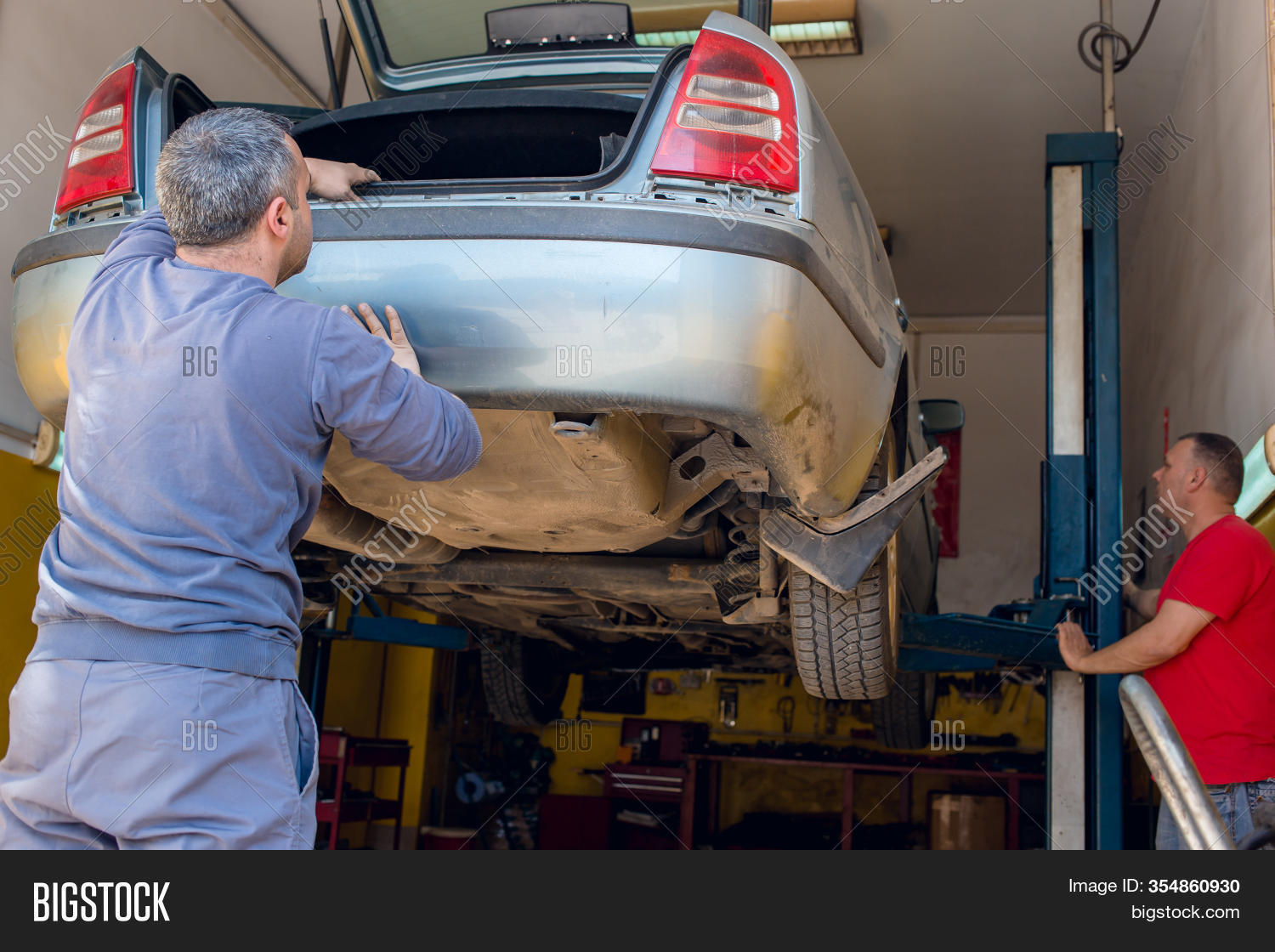 Car Mechanics Working Image & Photo (Free Trial) | Bigstock