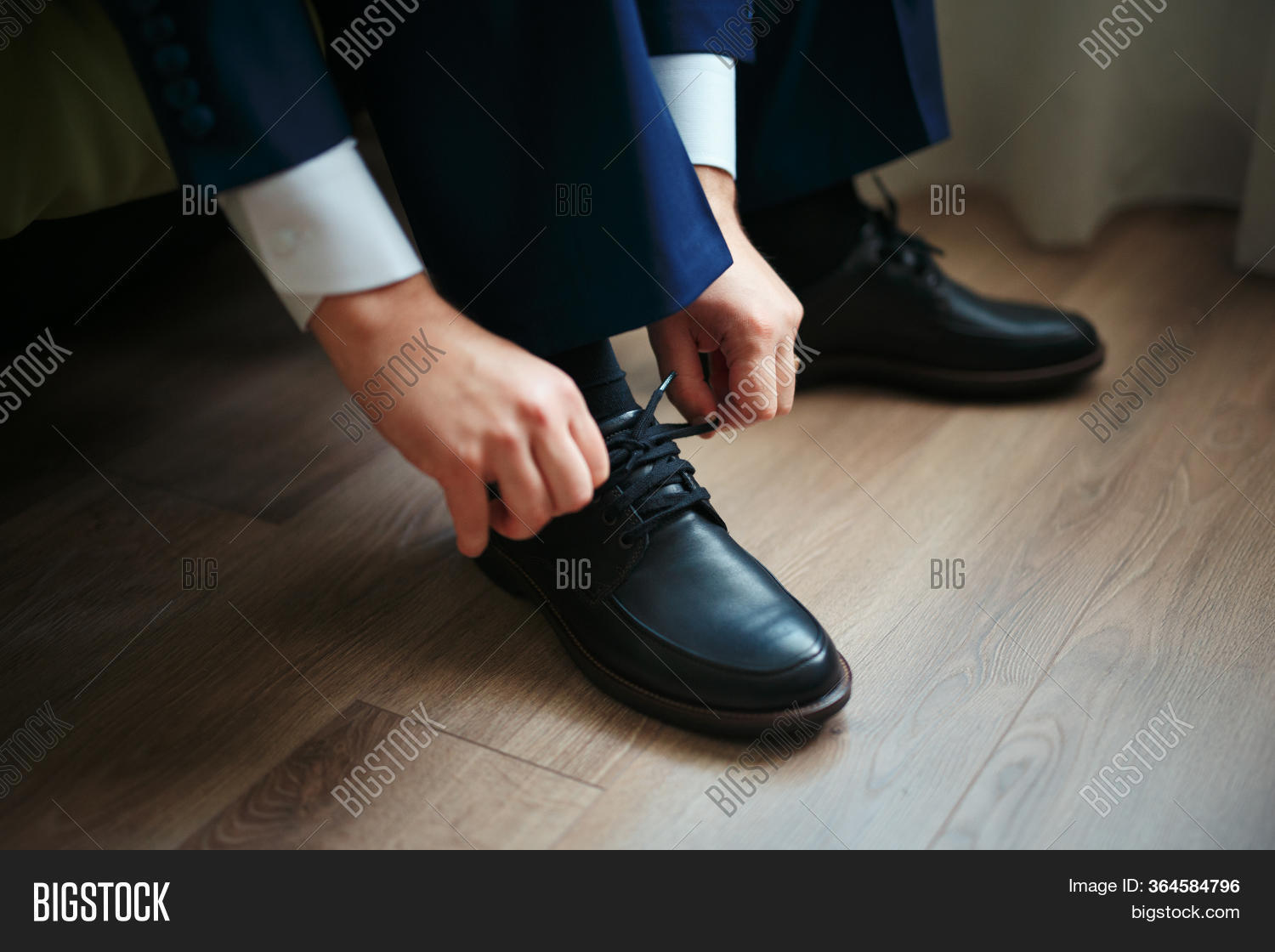 Man Tying Laces On Image & Photo (Free Trial) | Bigstock