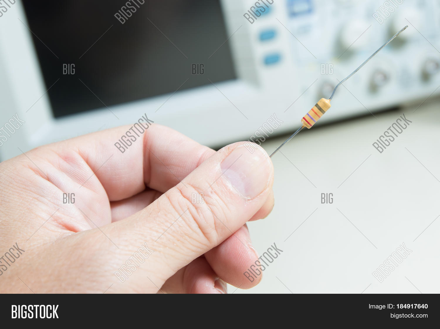 Man Holding Resistor Image & Photo (Free Trial) | Bigstock