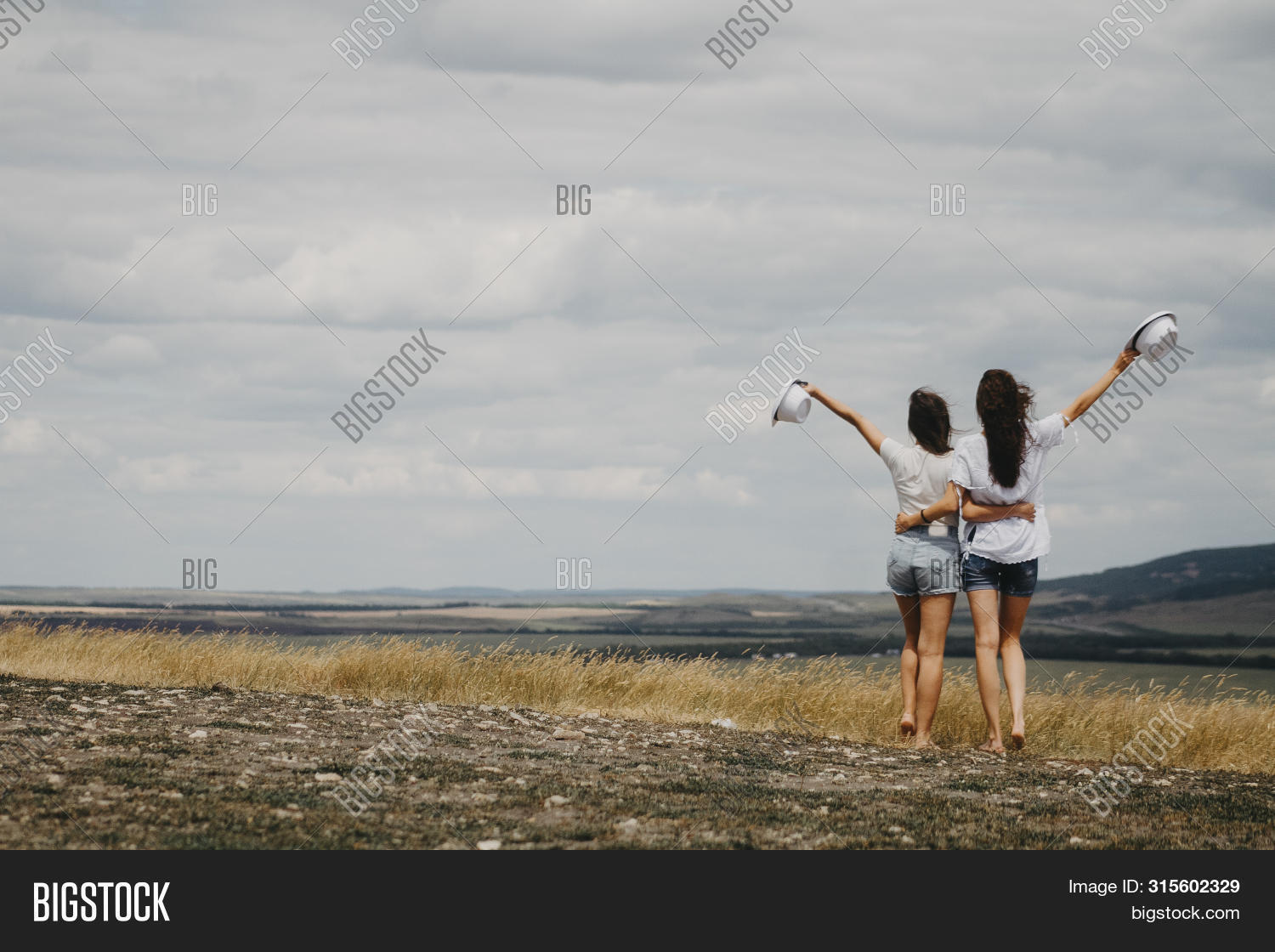 Two Girls Hug Each Image & Photo (Free Trial) | Bigstock
