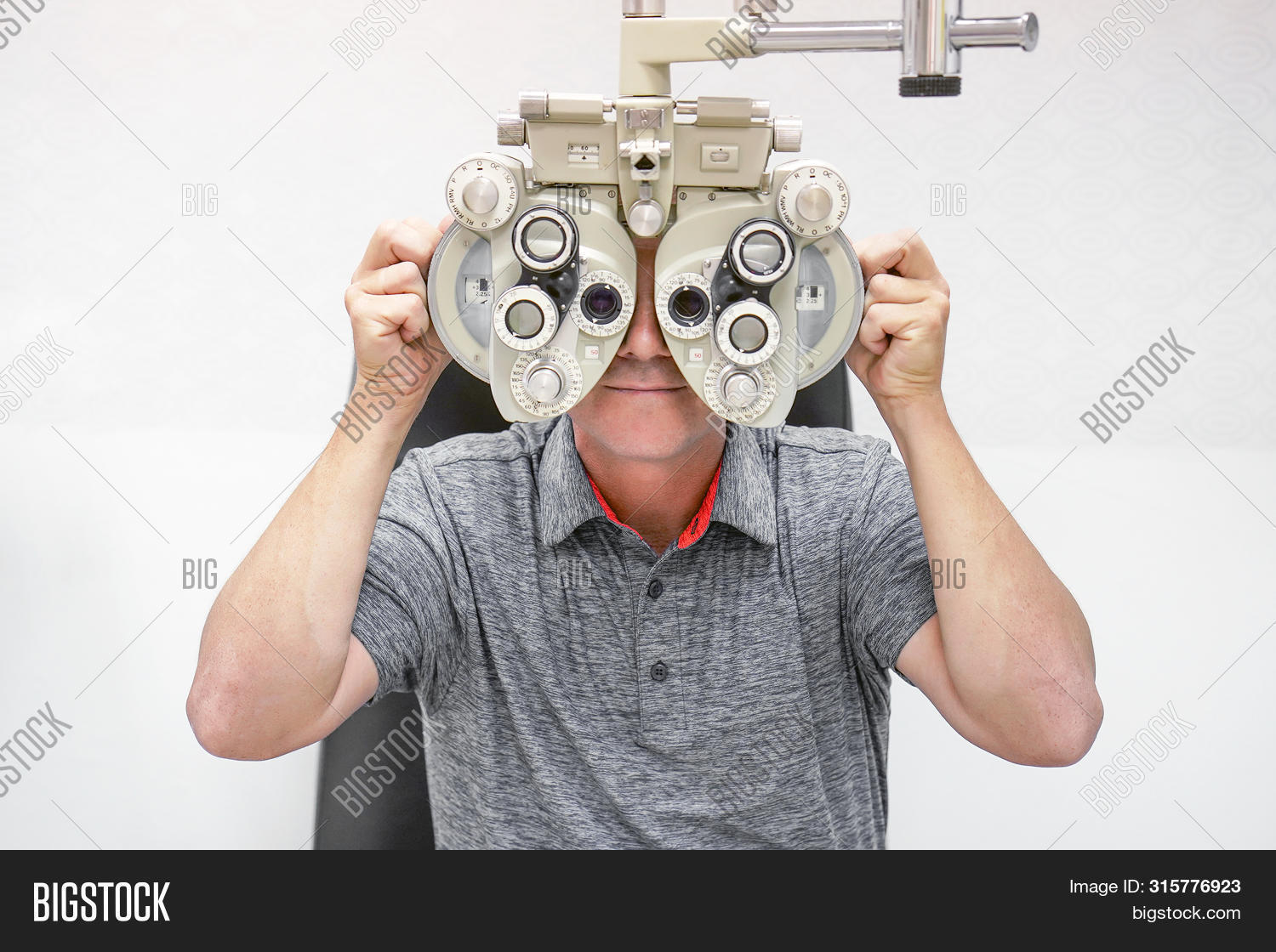 Man Checks Eyesight Image & Photo (Free Trial) | Bigstock