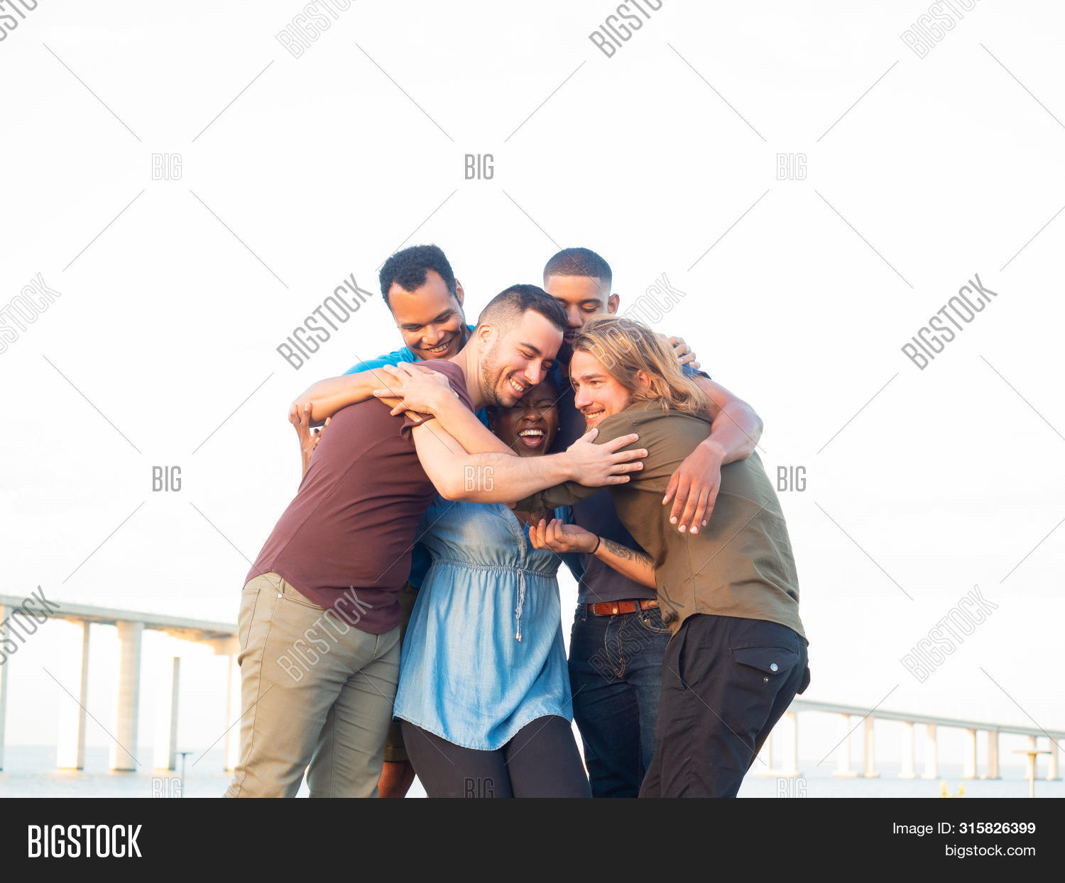 Group Of Friends Hugging