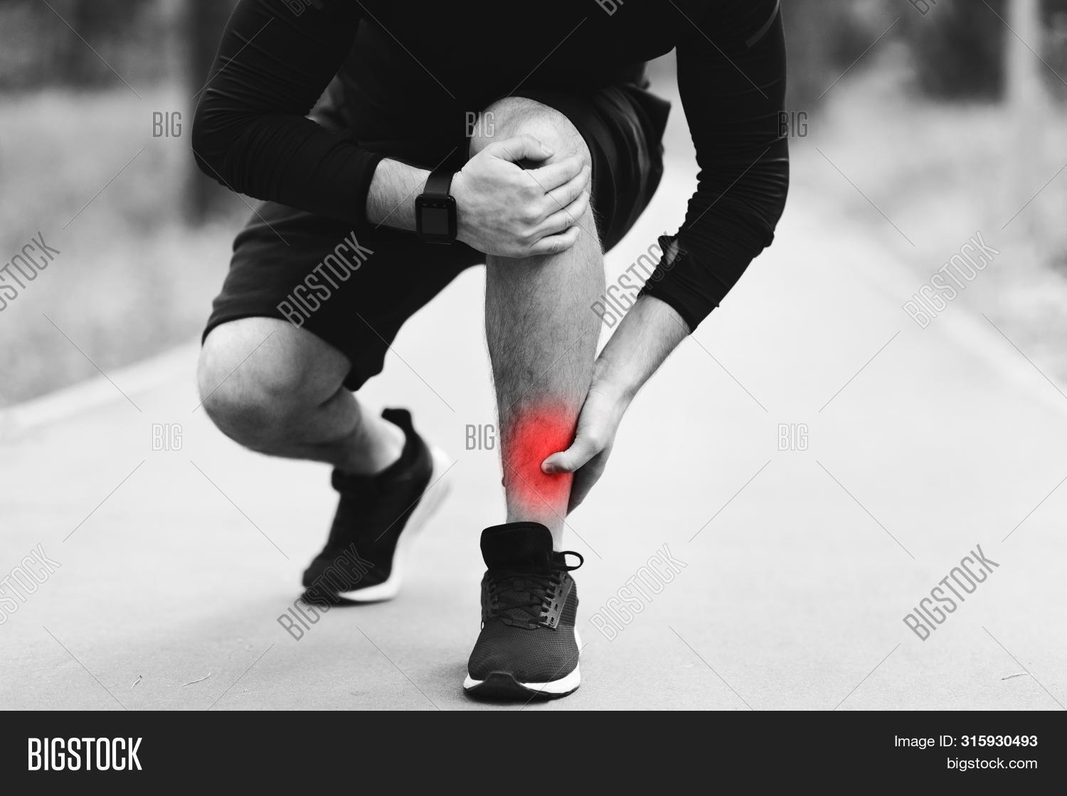 Man Sprain On Leg Image & Photo (Free Trial) | Bigstock