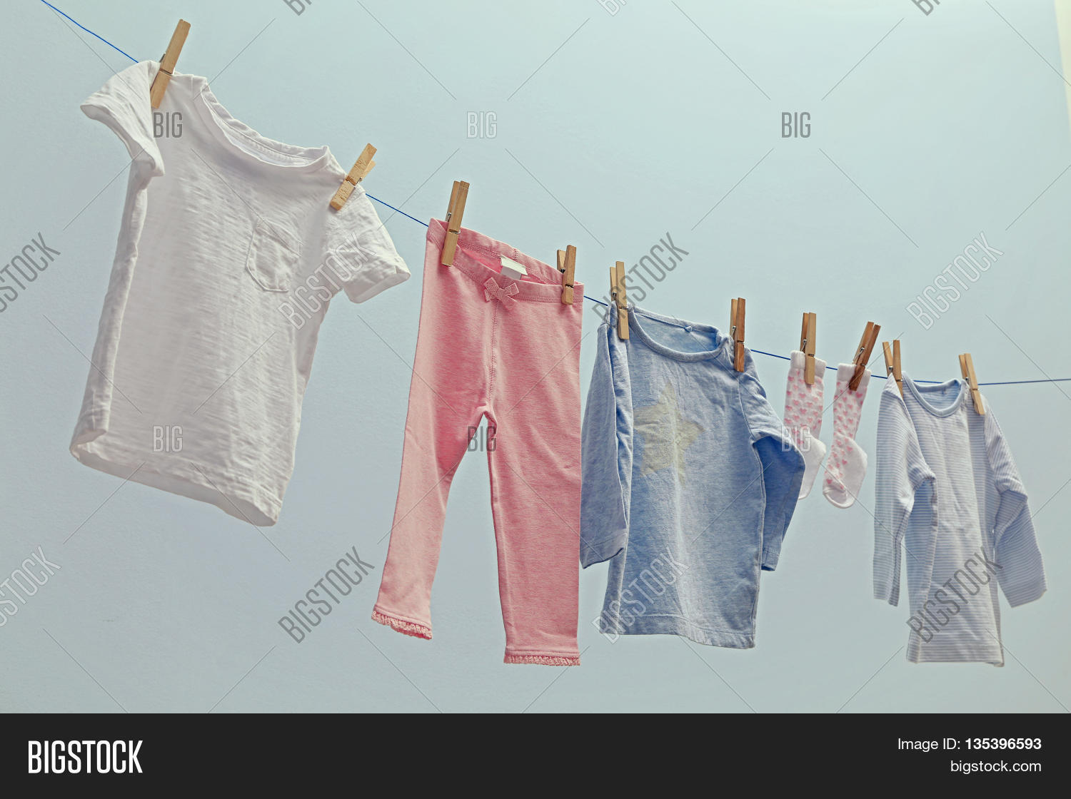 Baby Clothes Hanging Image & Photo (Free Trial) | Bigstock