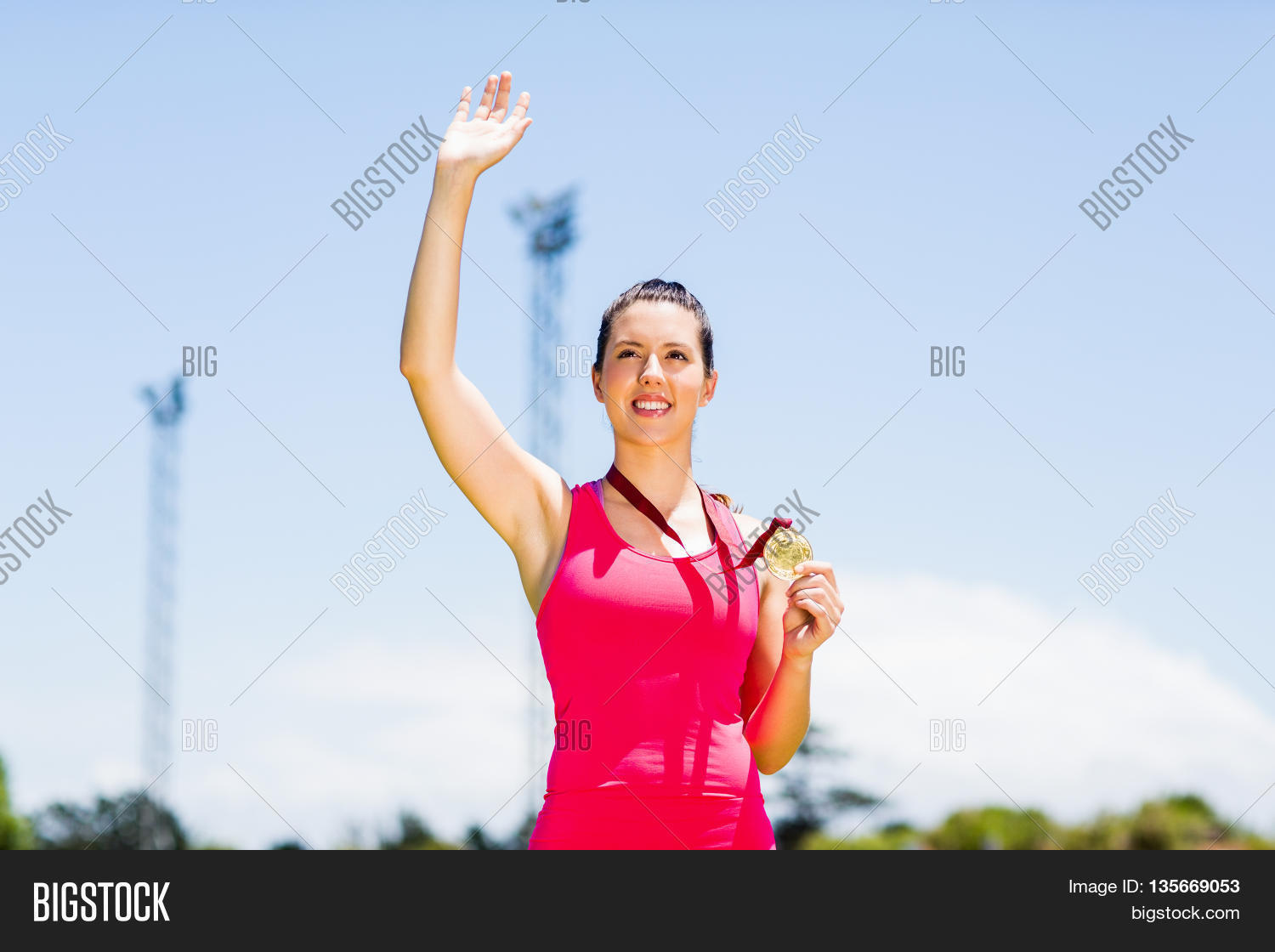 Female Athlete Waving Image & Photo (Free Trial) | Bigstock