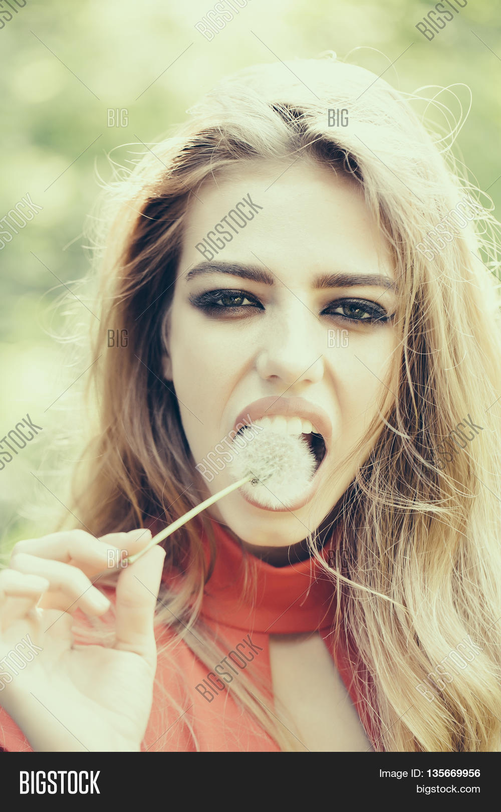 Girl Eating Dandelion Image & Photo (Free Trial) | Bigstock