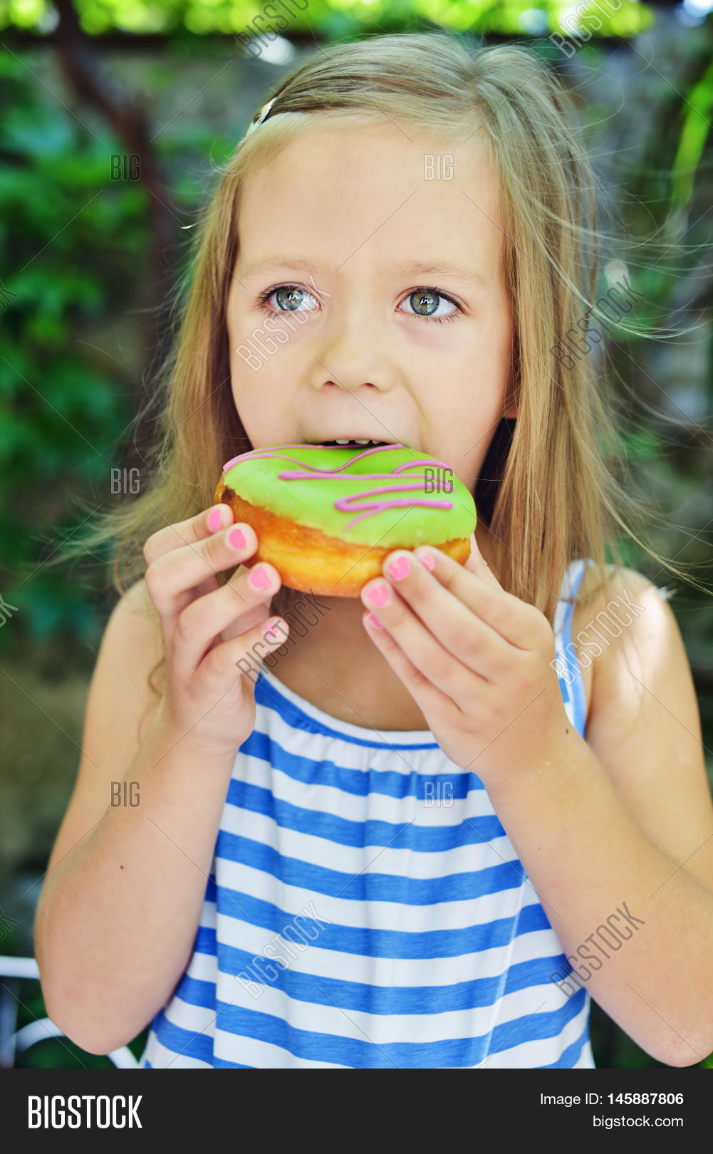 Girl Eating Donuts Image & Photo (Free Trial) | Bigstock