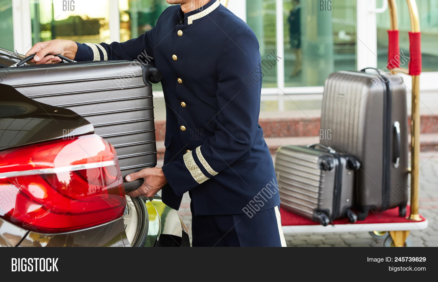 Bellboy Taking Baggage Image & Photo (Free Trial) | Bigstock