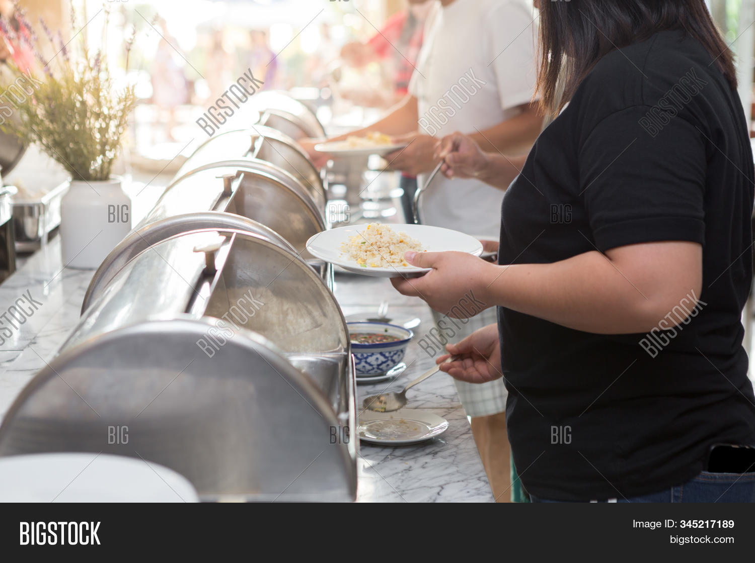 Women Scooping Food Image & Photo (Free Trial) | Bigstock