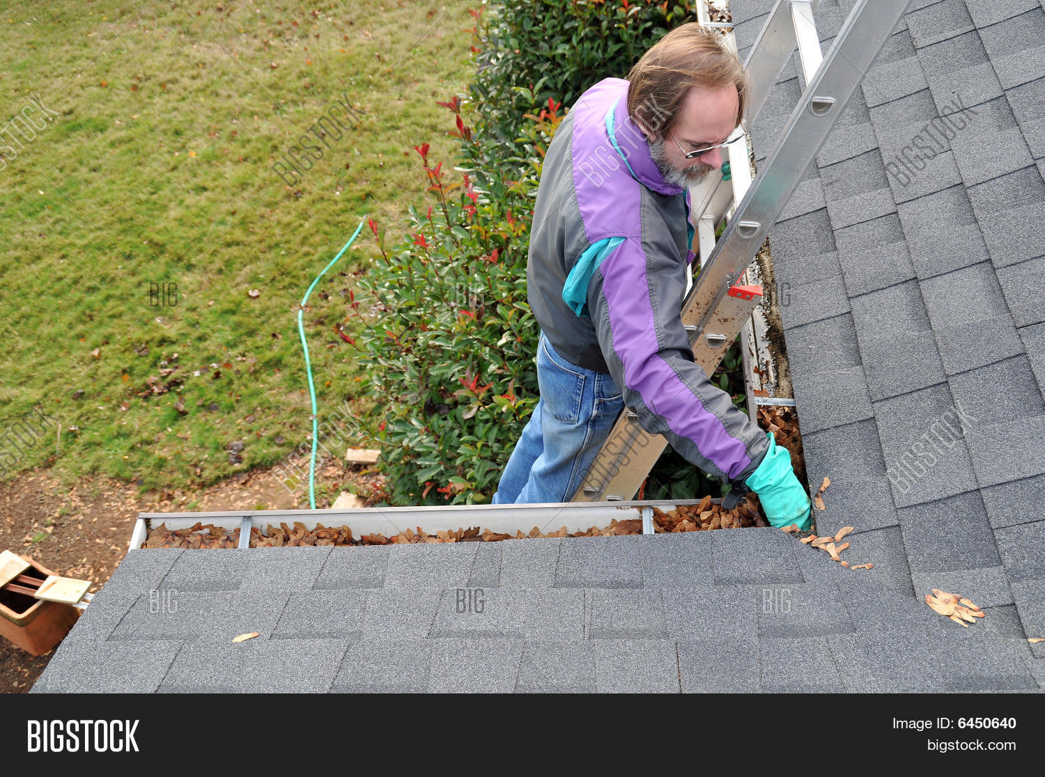 Man Cleaning Gutters Image & Photo (Free Trial) | Bigstock