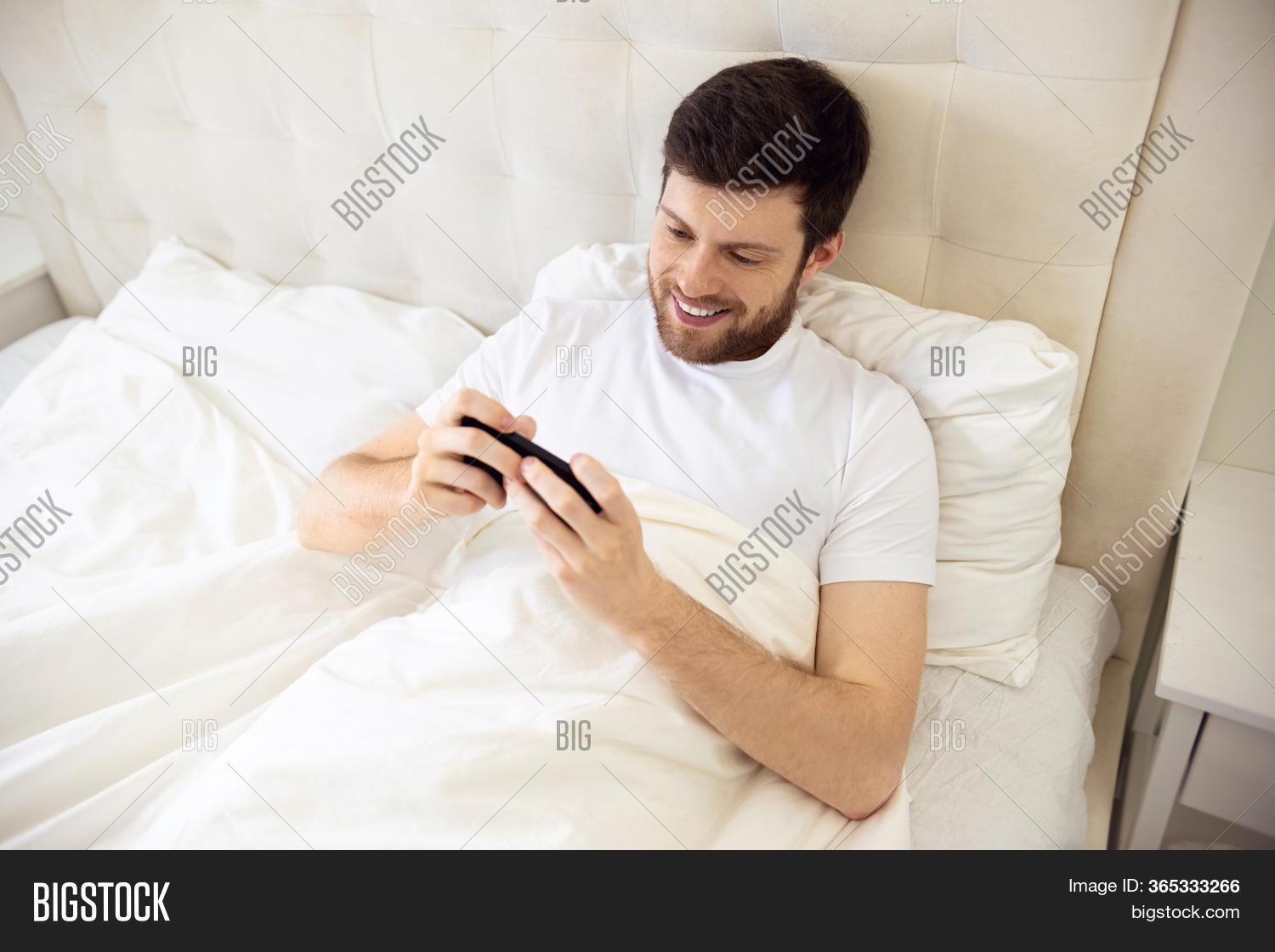 Man Laying Bed Playing Image & Photo (Free Trial) | Bigstock