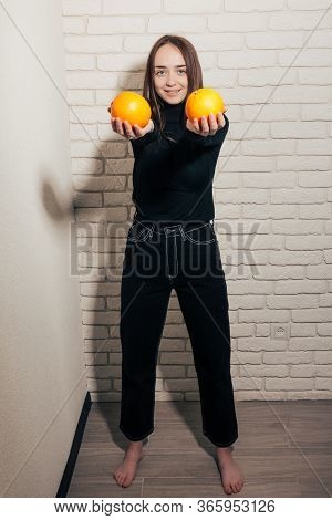 Girl Two Big Oranges Image & Photo (Free Trial) | Bigstock