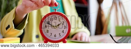 Businesswoman Holding Red Alarm Clock At Workplace. Time Management And ...