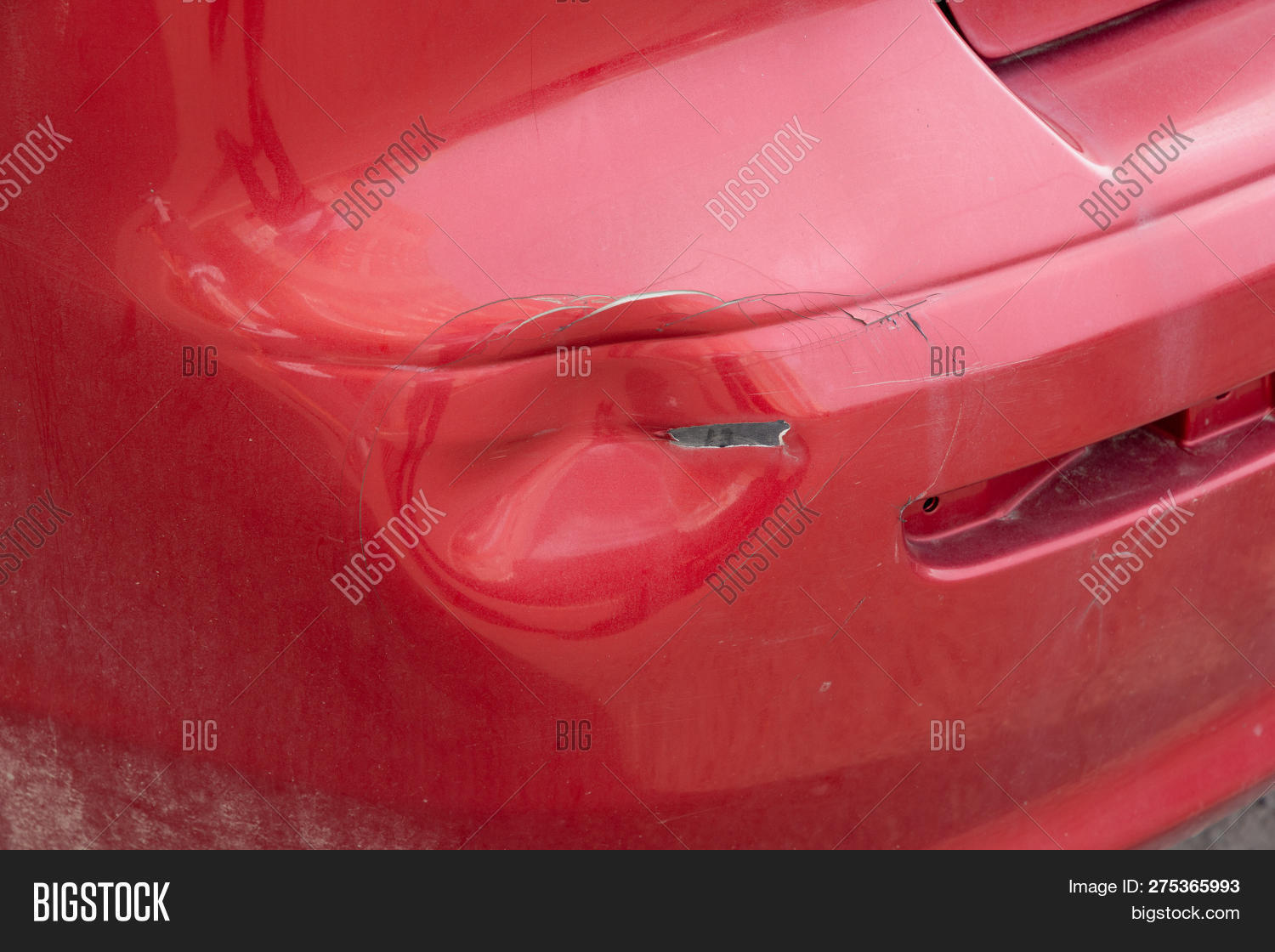 Damaged Red Car