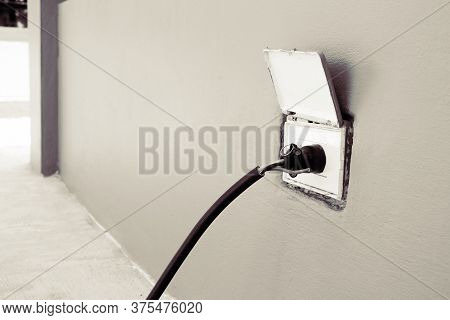 Plug Plugged Into Wall Image & Photo (Free Trial) | Bigstock