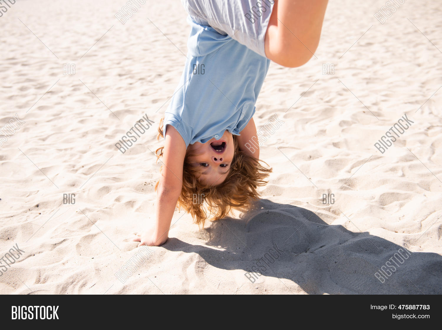 Kid Jumping Upside Image & Photo (Free Trial) | Bigstock