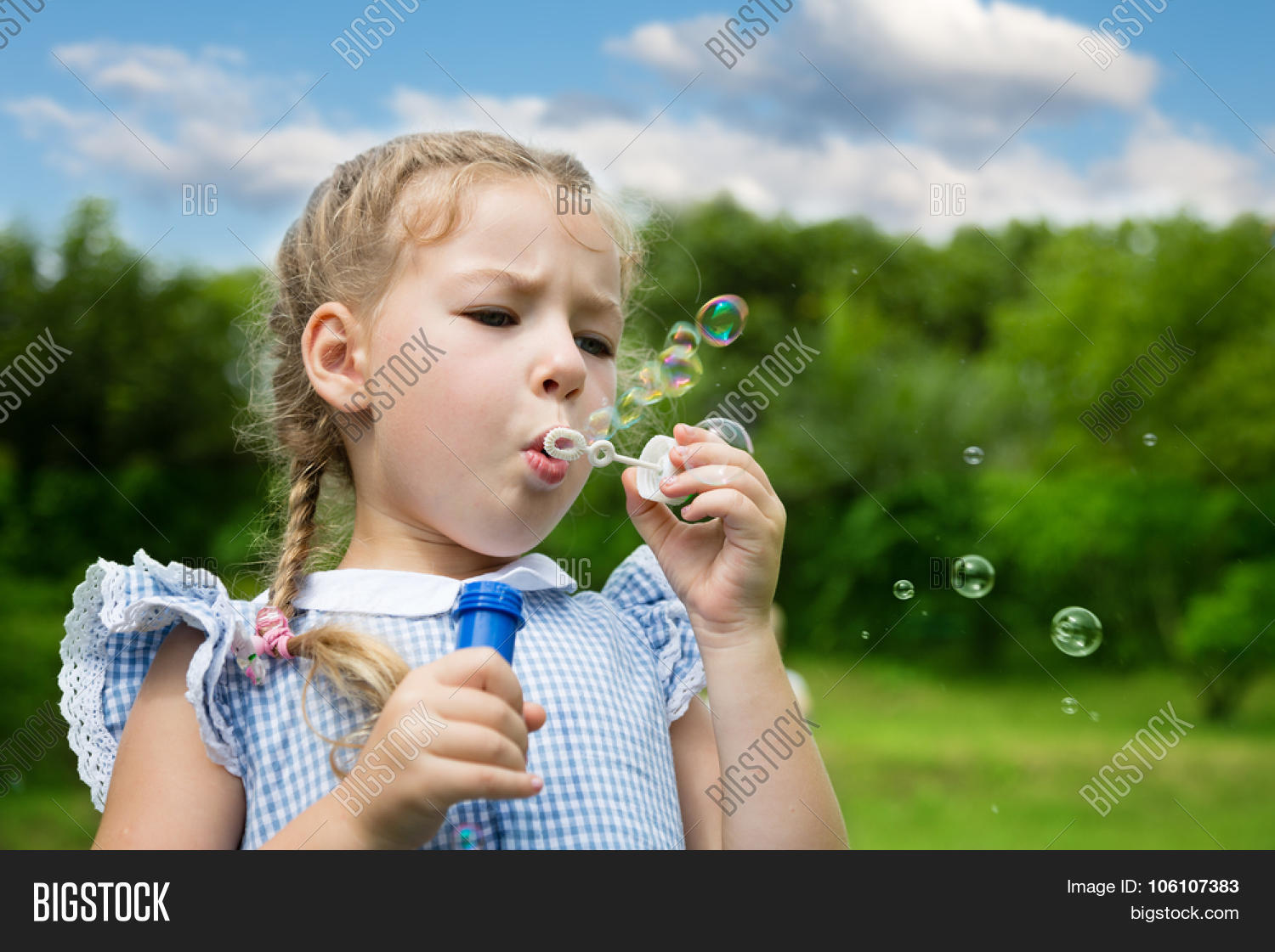 Little Girl Blowing Image & Photo (Free Trial) | Bigstock