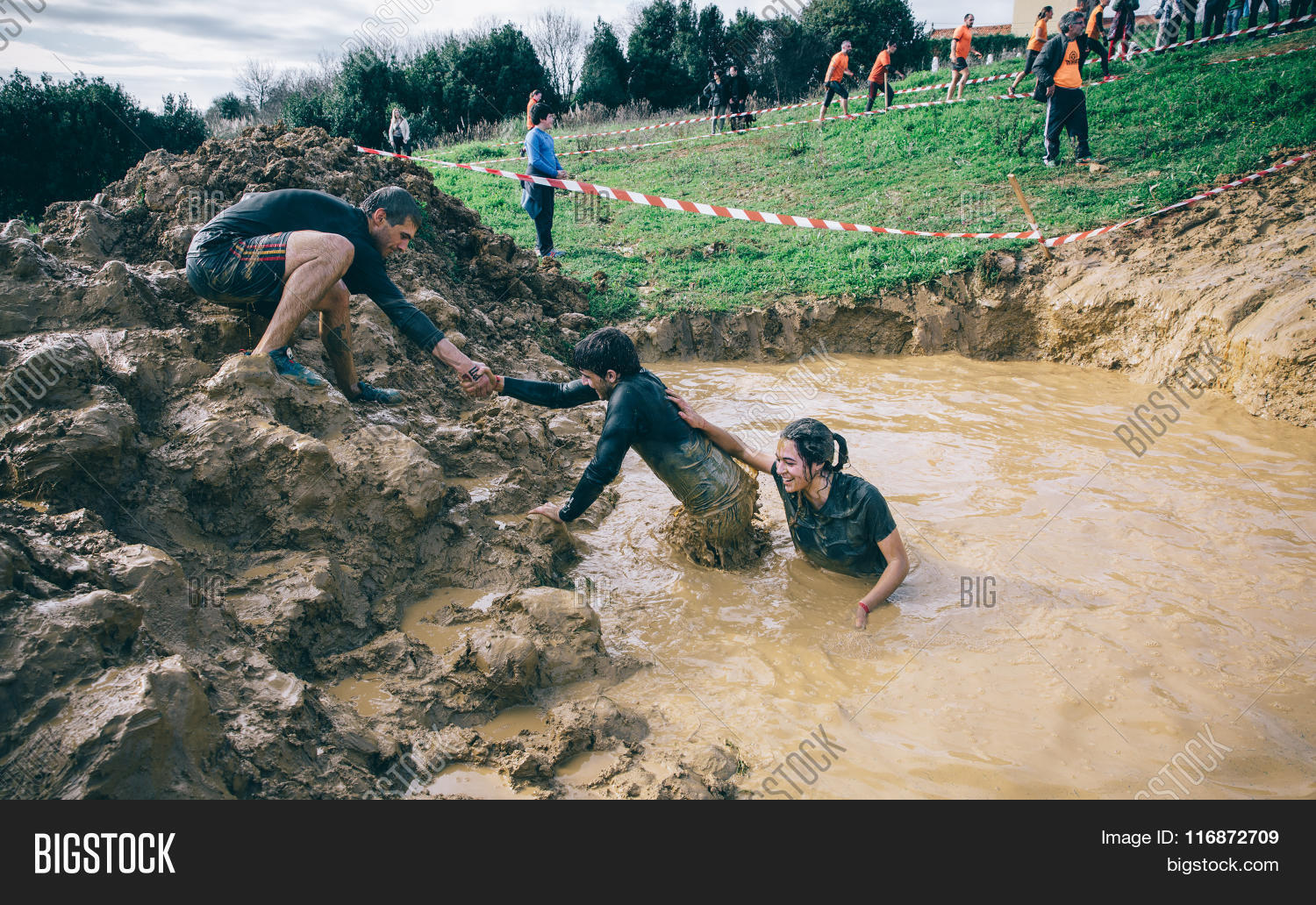 Team Helping Cross Mud Image & Photo (Free Trial) | Bigstock