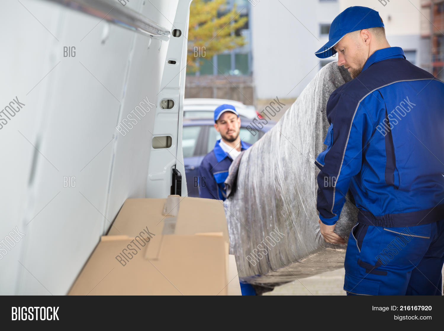 Two Happy Male Movers Image & Photo (Free Trial) | Bigstock