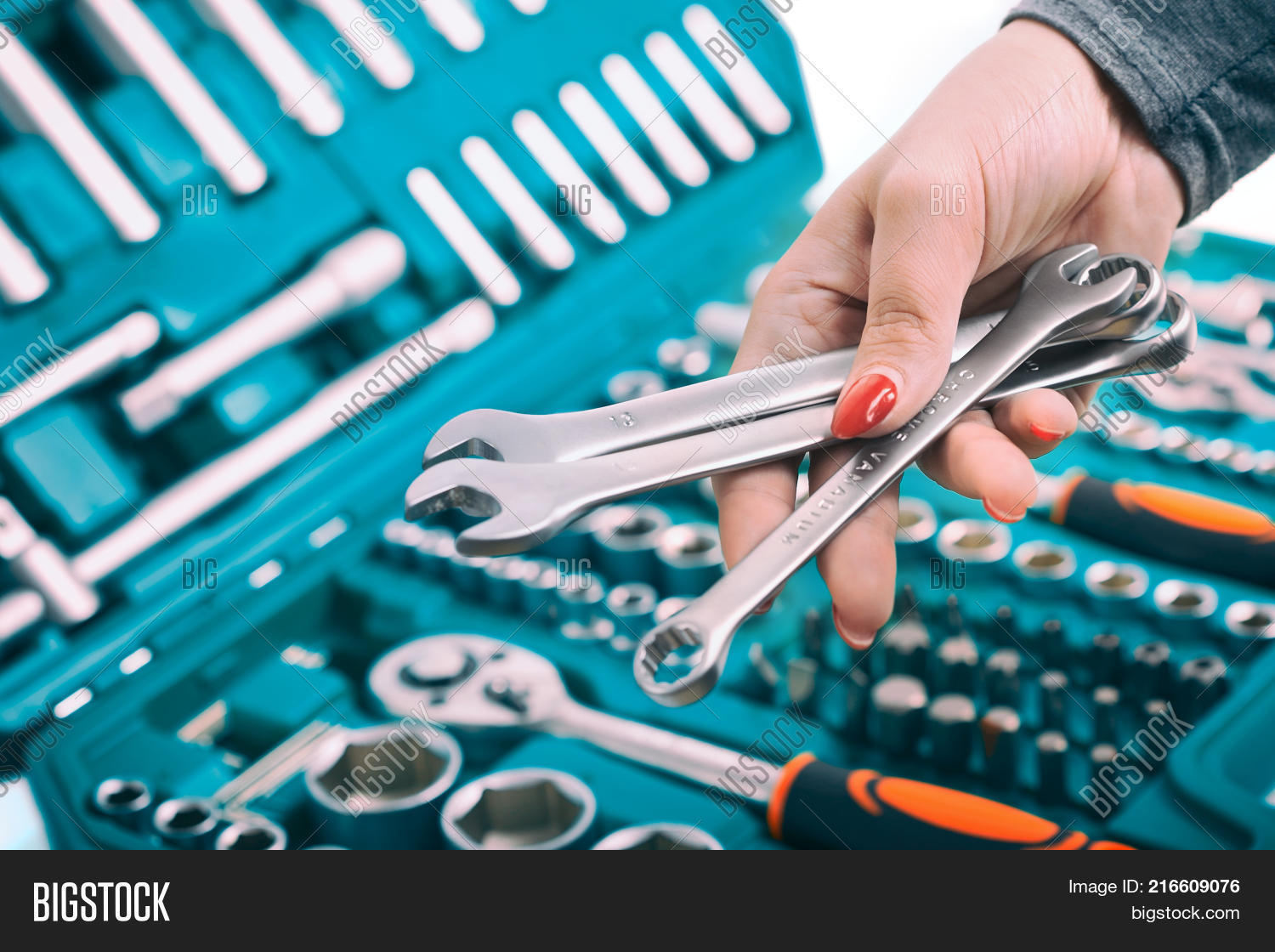 Woman Holding Tool Image & Photo (Free Trial) | Bigstock