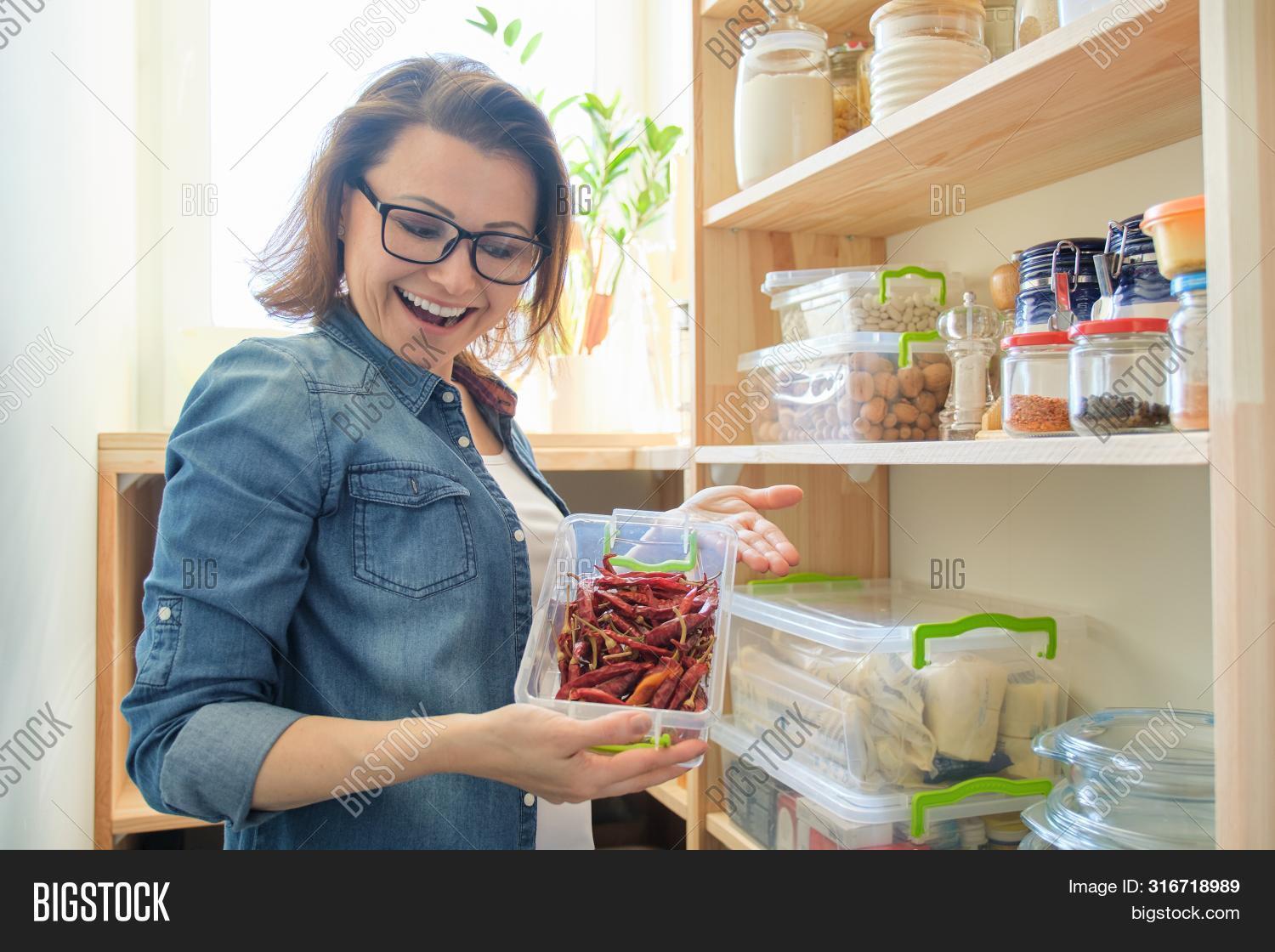 Woman Pantry Holding Image & Photo (Free Trial) | Bigstock