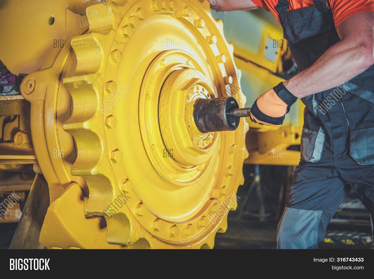 Bulldozer Pro Mechanic Image & Photo (Free Trial) | Bigstock