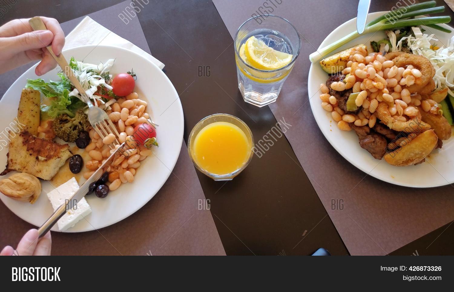 Two People Eating Image & Photo (Free Trial) | Bigstock