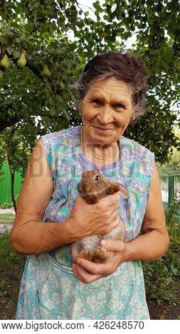 Senior Woman Holds Image & Photo (Free Trial) | Bigstock