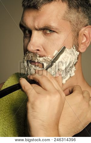Man Is Shaving With Straight Razor. Fashion And Beauty, Innovation. Serious Hipster In ...