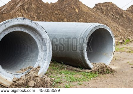Reinforced Concrete Storm Sewer Pipes Of Large Diameter Stacked At A ...