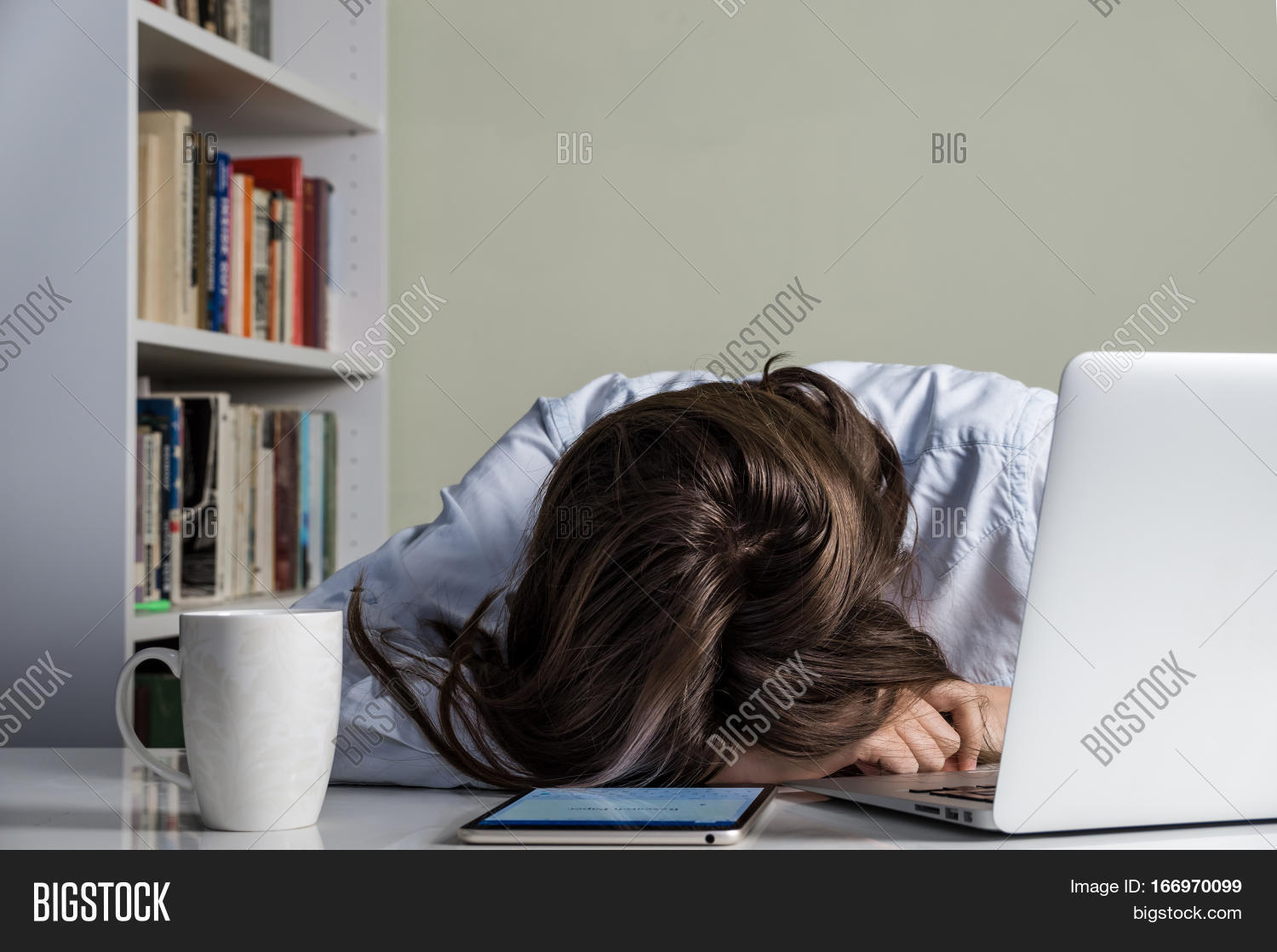 Woman Sleeping Under Desk
