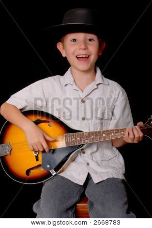 Young Cowboy Musician Image & Photo (Free Trial) | Bigstock